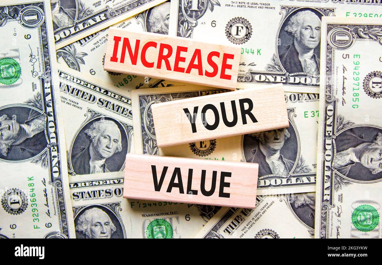 Increase your value symbol. Concept words Increase your value on wooden ...