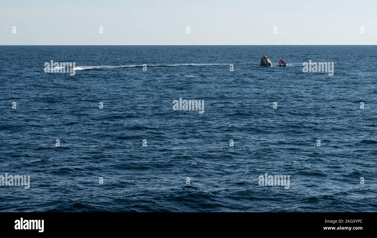 NASA’s SpaceX Crew-4 Splashdown. Support teams work around the SpaceX Crew Dragon Freedom ...