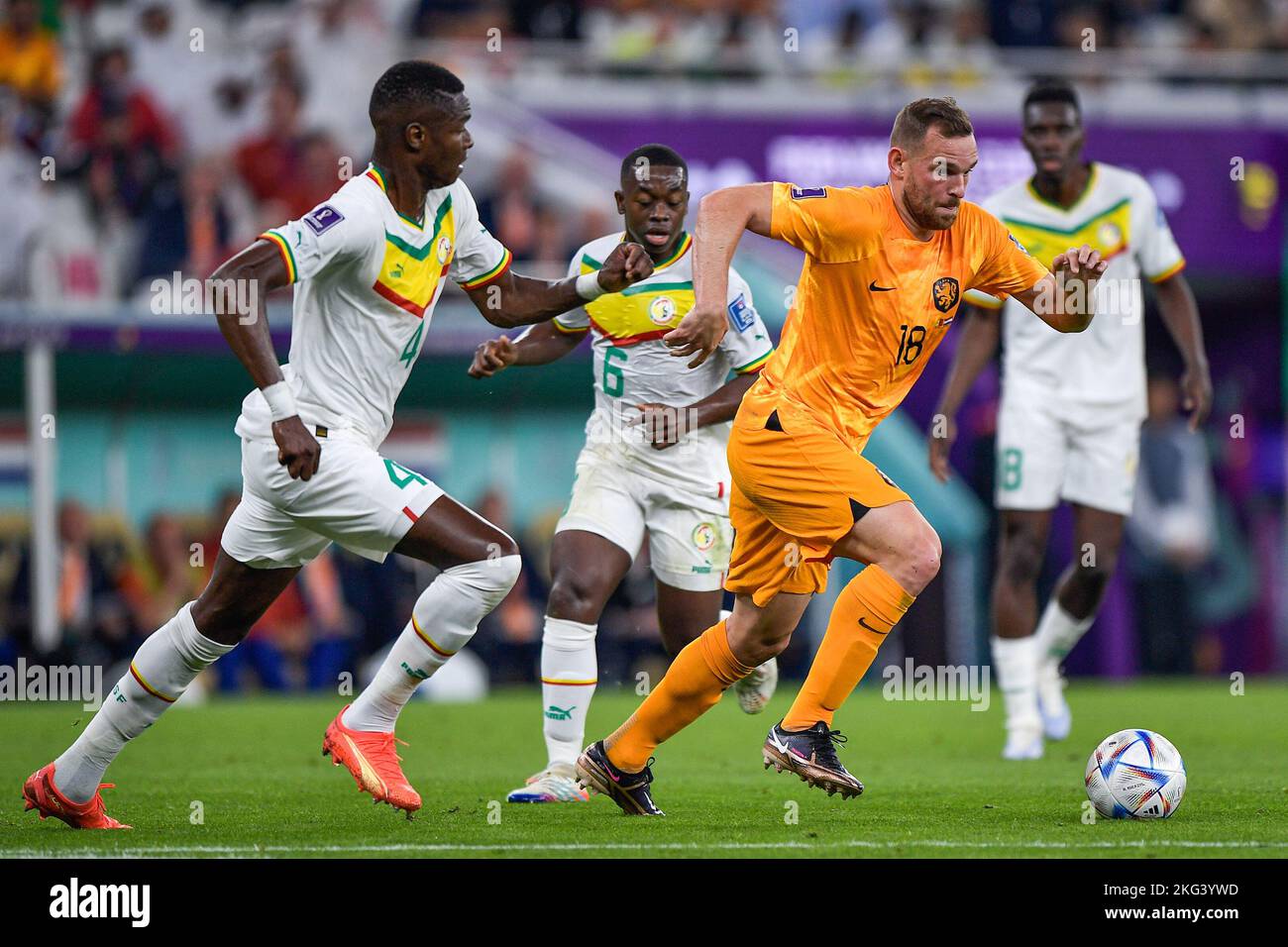 DOHA, QATAR - NOVEMBER 21: Vincent Janssen of the Netherlands battles ...