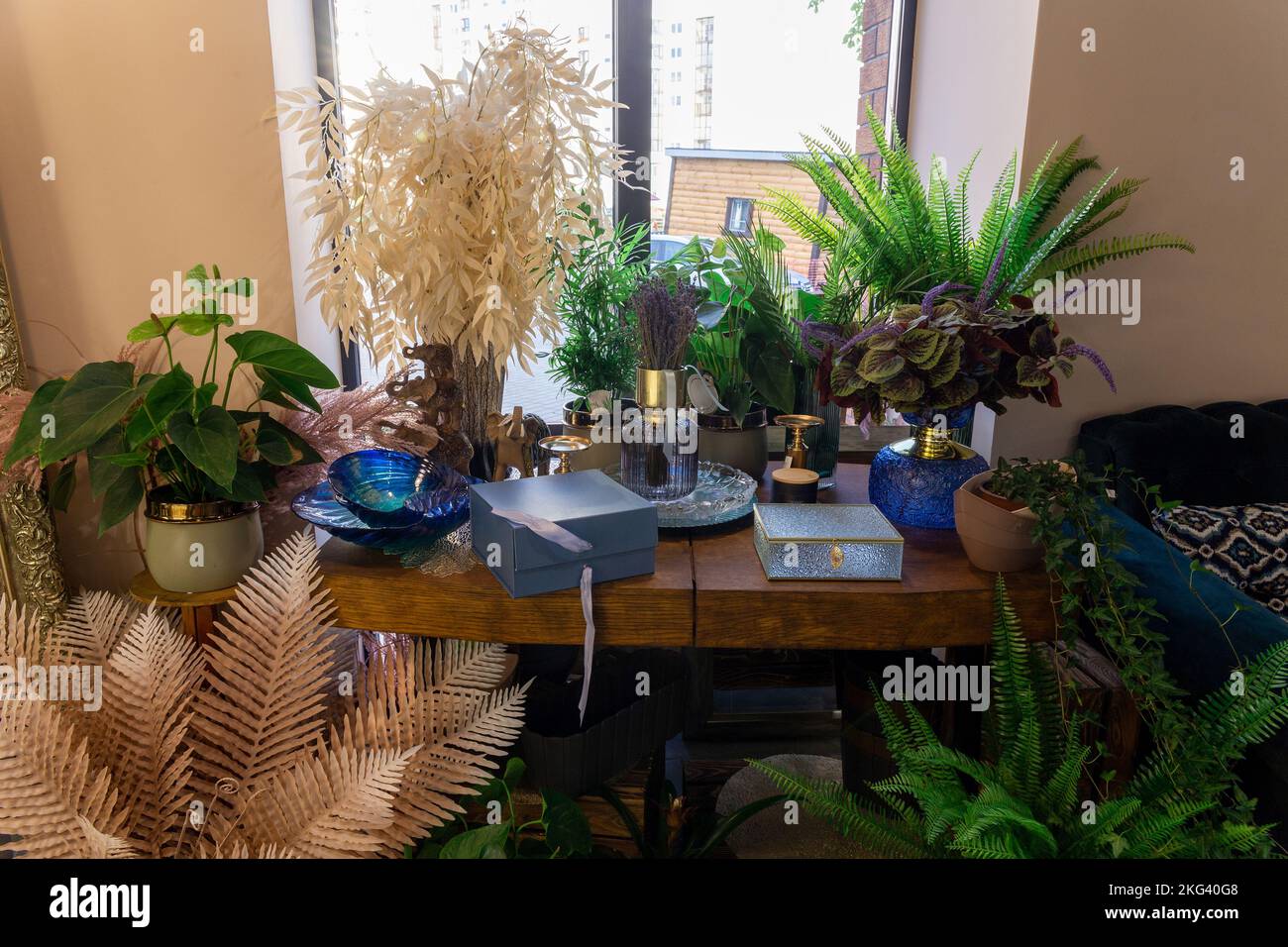 Small business. Flower shop interior. Floral design studio, decorations ...
