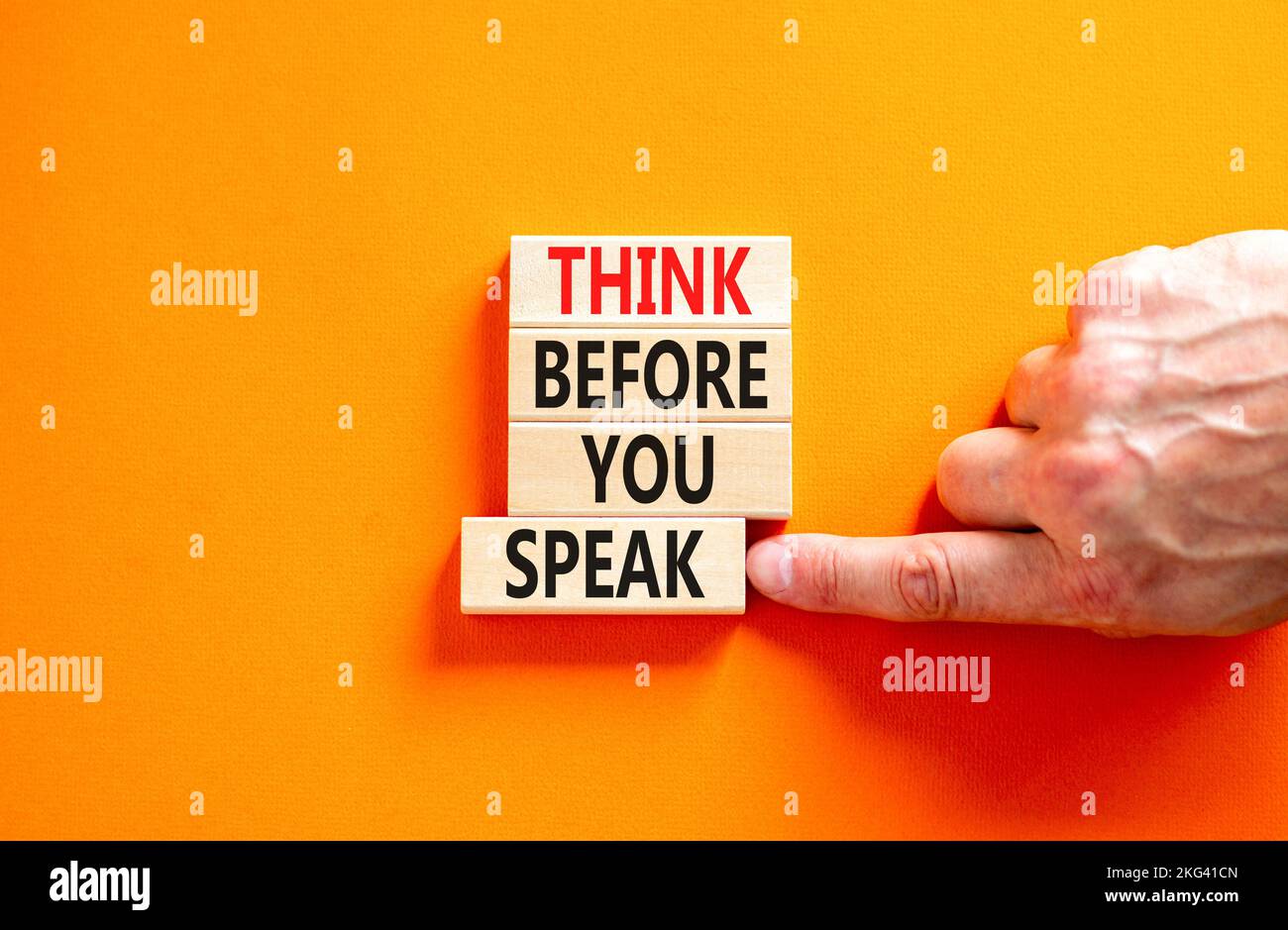 Think before you speak symbol. Concept words Think before you speak on wooden cubes. Beautiful ...