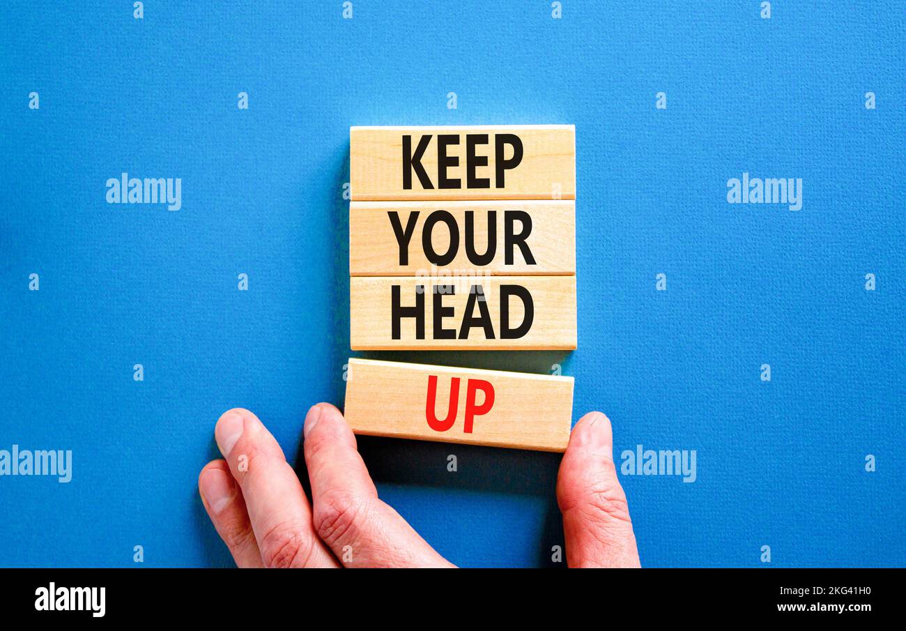 Keep your head up symbol. Concept words Keep your head up on wooden ...