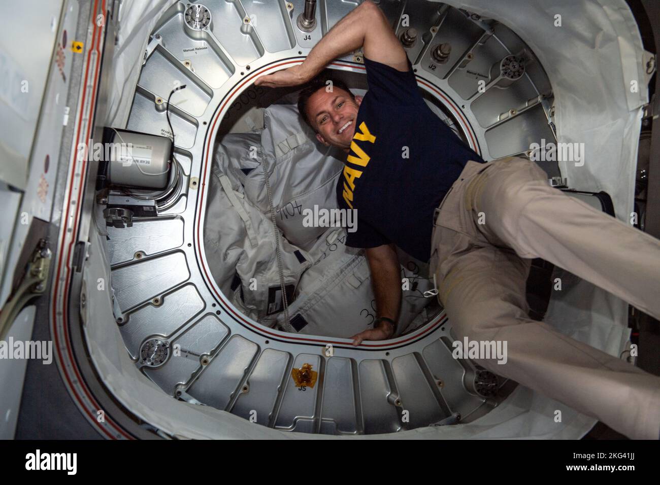 NASA astronaut and Expedition 68 Flight Engineer Josh Cassada poses in ...