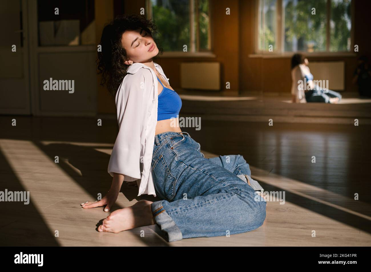 Girl is dancing contemporary dance indoors the hall Stock Photo - Alamy