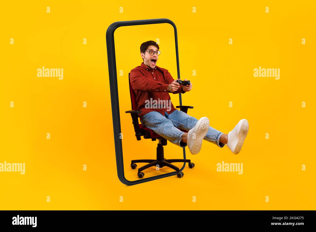 Happy surprised young european man gamer with open mouth in glasses ...