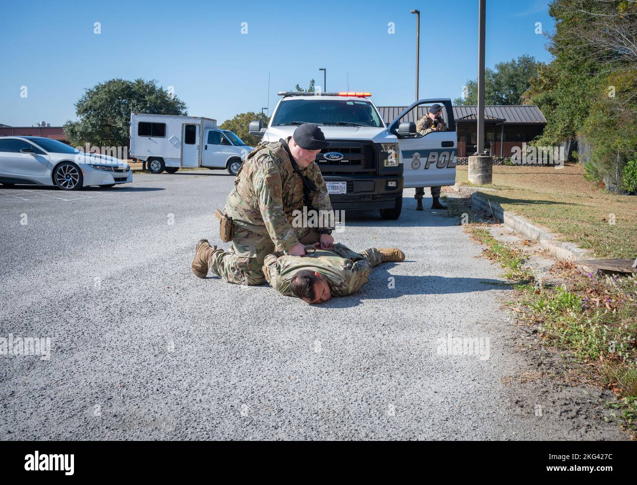 U.S. Air Force Staff Sgt. Chance Martin, left, a fire team member with ...