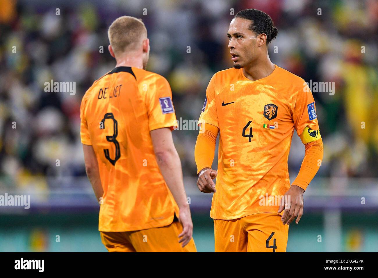 DOHA, QATAR - NOVEMBER 21: Matthijs de Ligt of the Netherlands discusses with Virgil van Dijk of ...