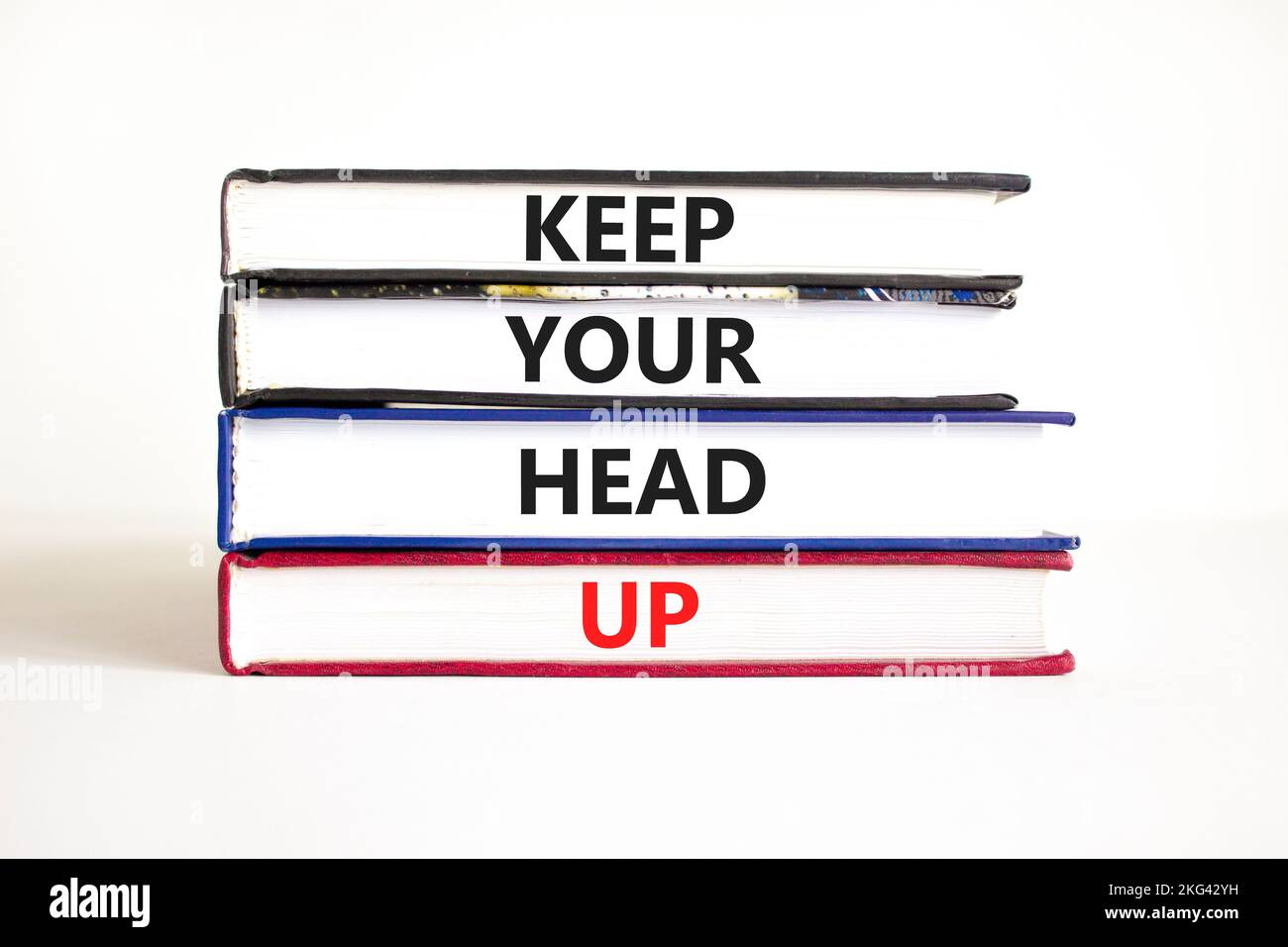 Keep your head up symbol. Concept words Keep your head up on books ...