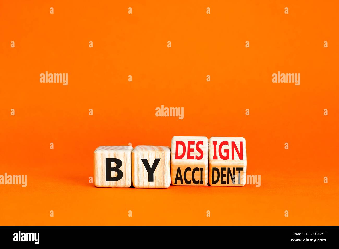 By accident and design symbol. Concept word By accident By design on ...