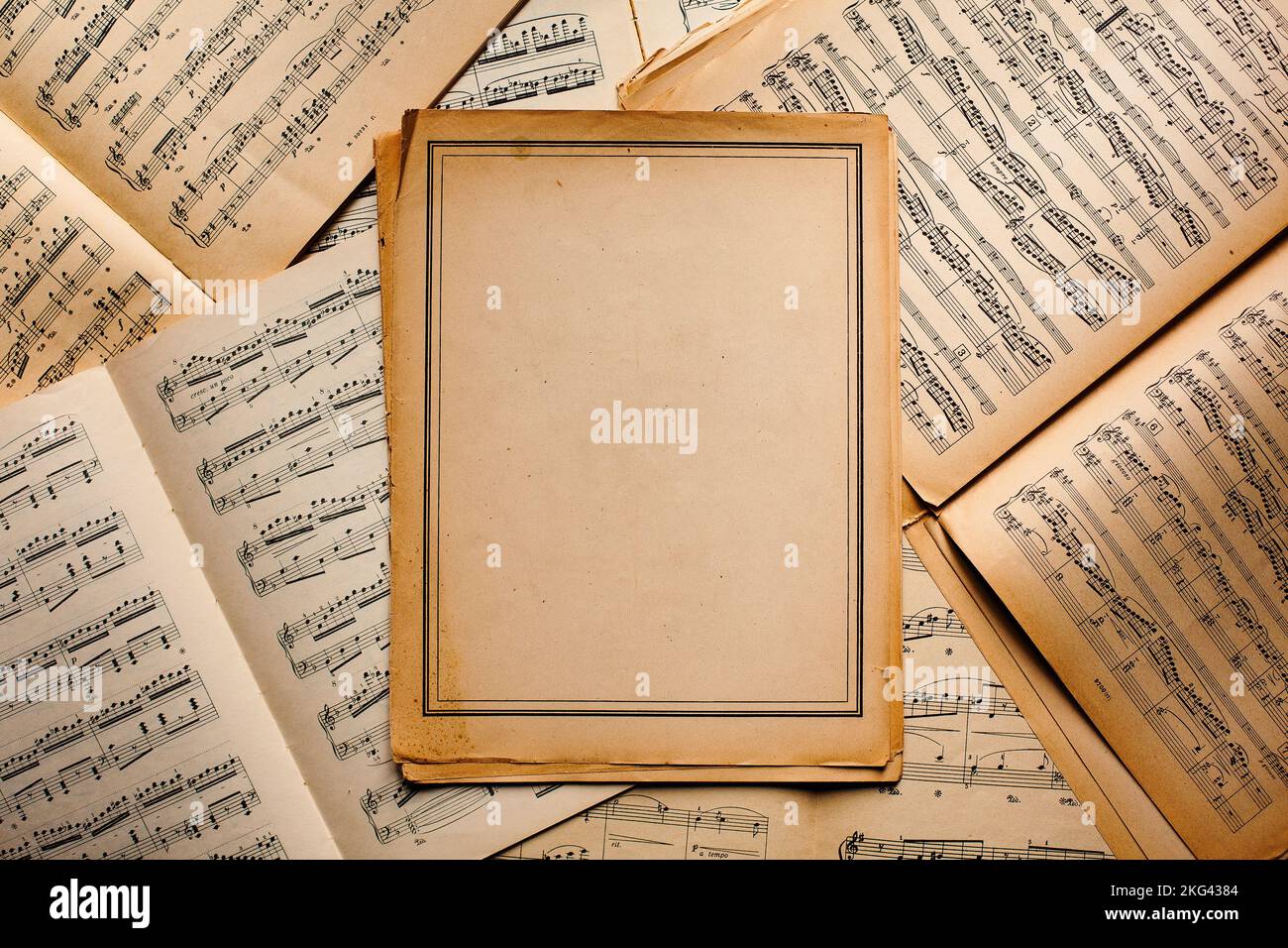 Vintage empty sheet of paper and music notes mock up Stock Photo - Alamy