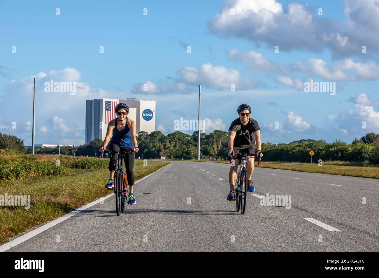 Diamond Tour De KSC. Two cyclists participate in the Diamond Tour de ...