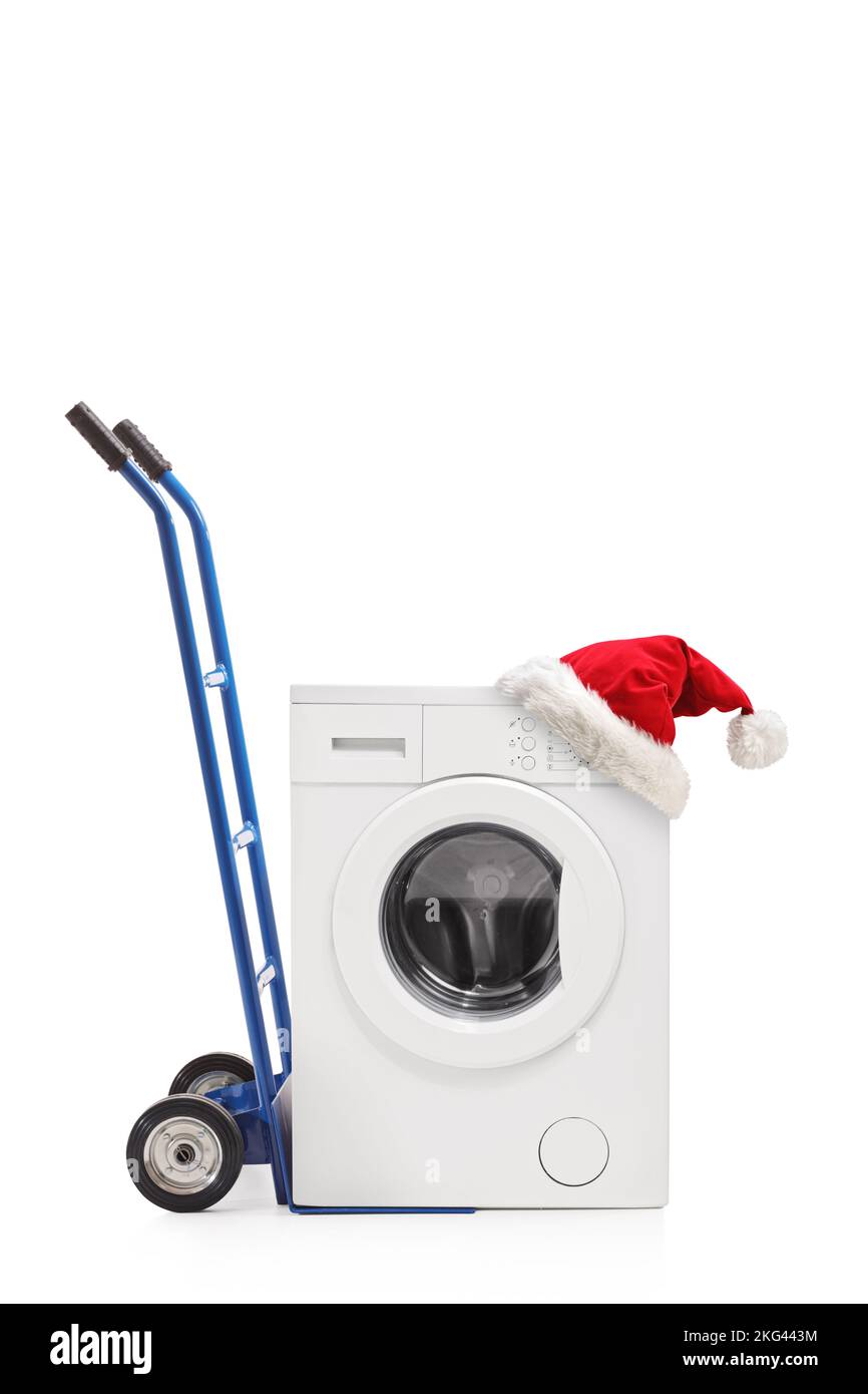 Santa claus hat on a washing machine isolated on white background Stock ...