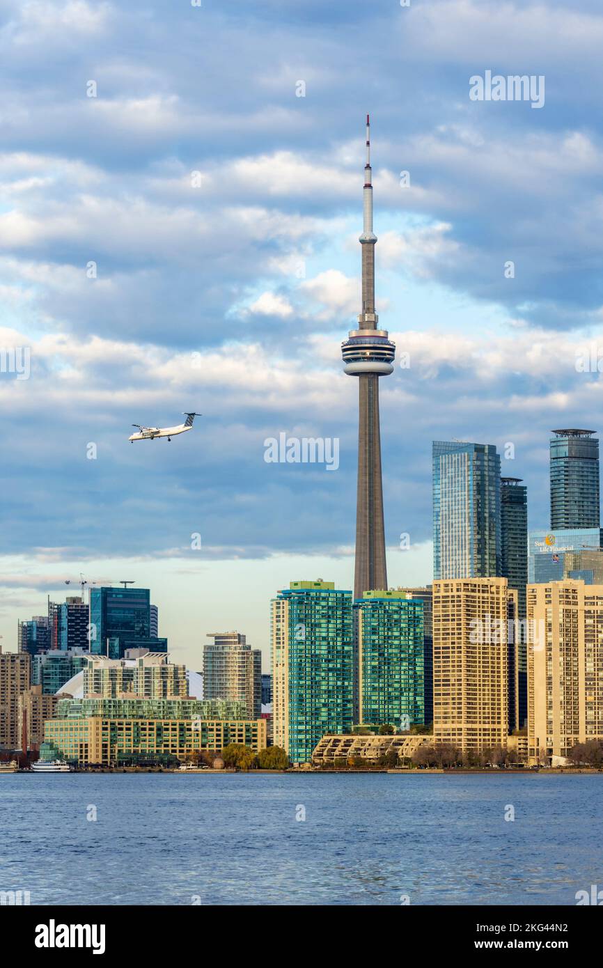 Airplane flying over Toronto skyline, Toronto downtown, Ontario, Canada ...