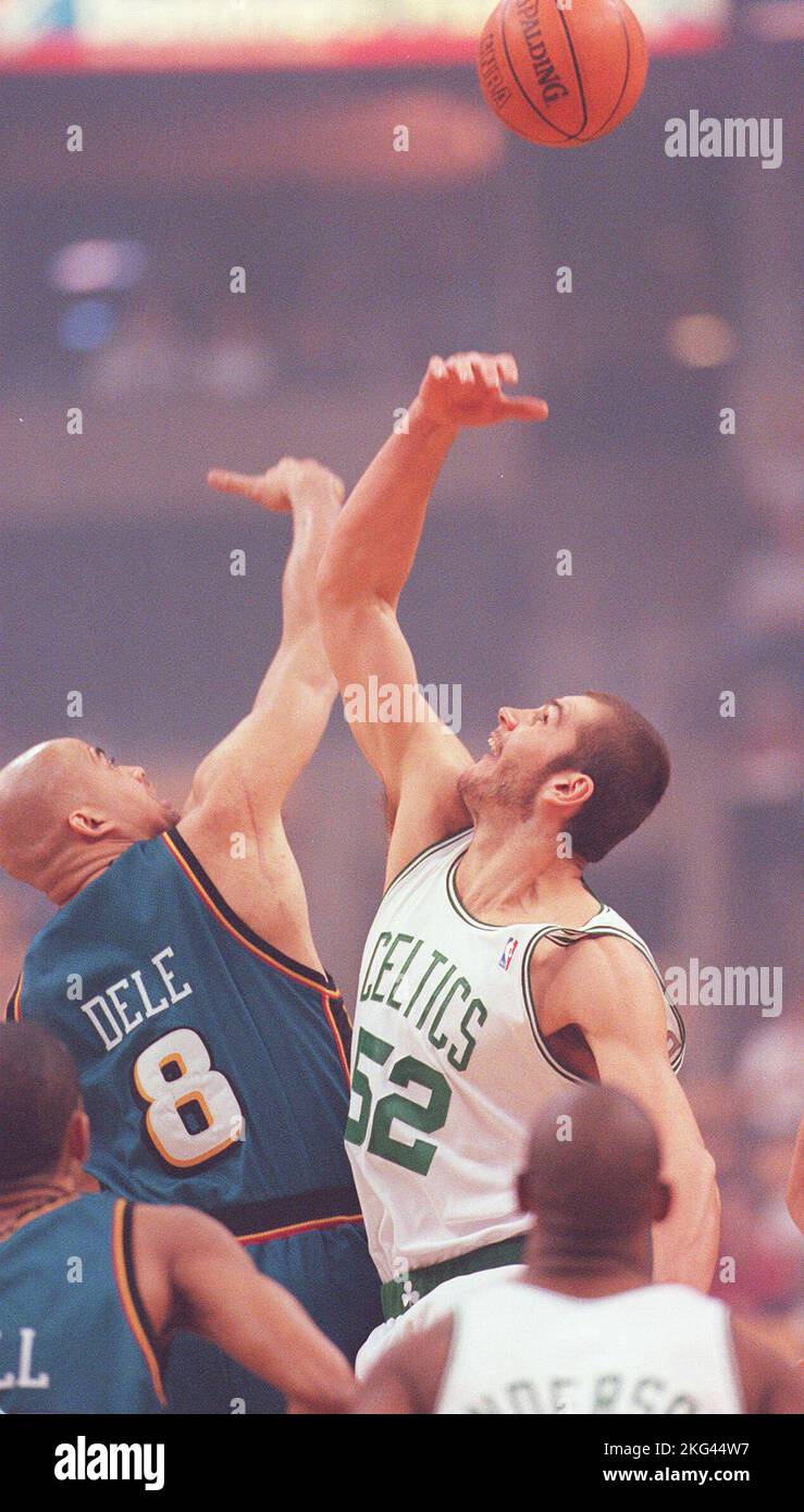 BISON DELE AND VITALY POTAPENKO TIP OFF THE GAME. Celtics v. Pistons. 3 ...