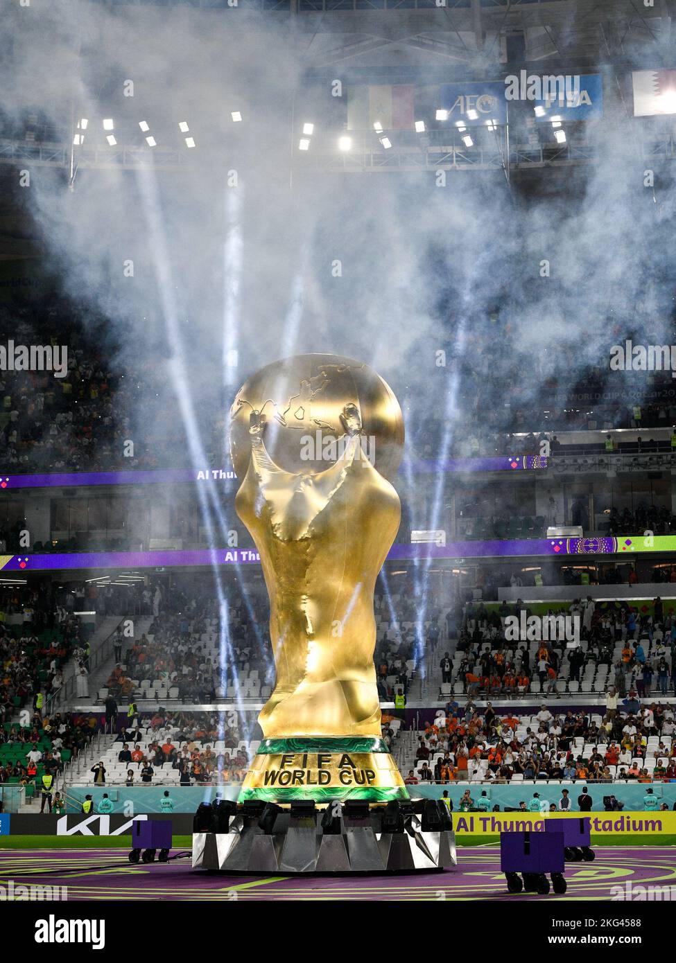 DOHA, QATAR - NOVEMBER 21: A giant replica of the FIFA World Cup trophy ...