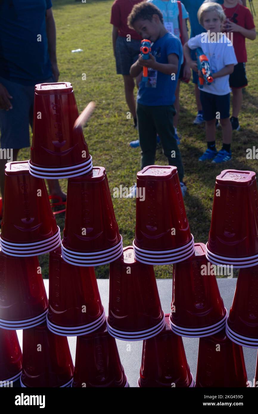 Military children participate in the marksmanship event during Kid’s ...