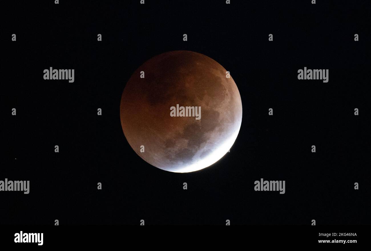Total Lunar Eclipse. The Moon is seen during a total lunar eclipse ...