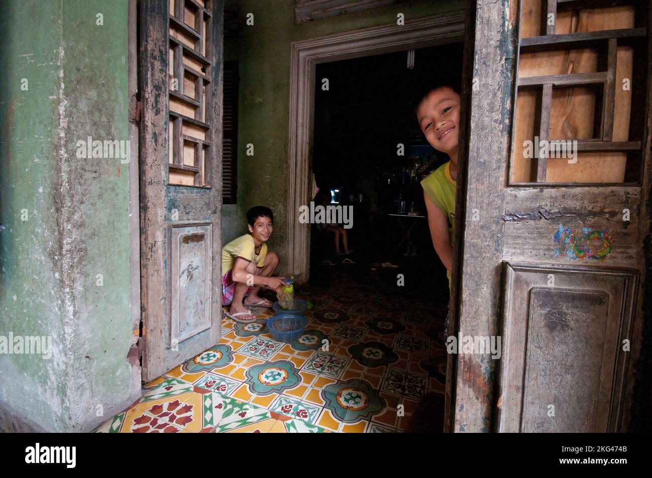 Happy smiling children at home. Young child preparing food for family ...