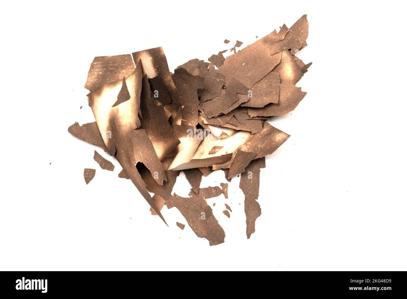 Burnt paper isolated on a white background. Copy space Stock Photo - Alamy