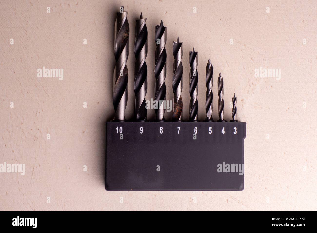 A set of wood drills in a container. Joiner's hand tool Stock Photo - Alamy