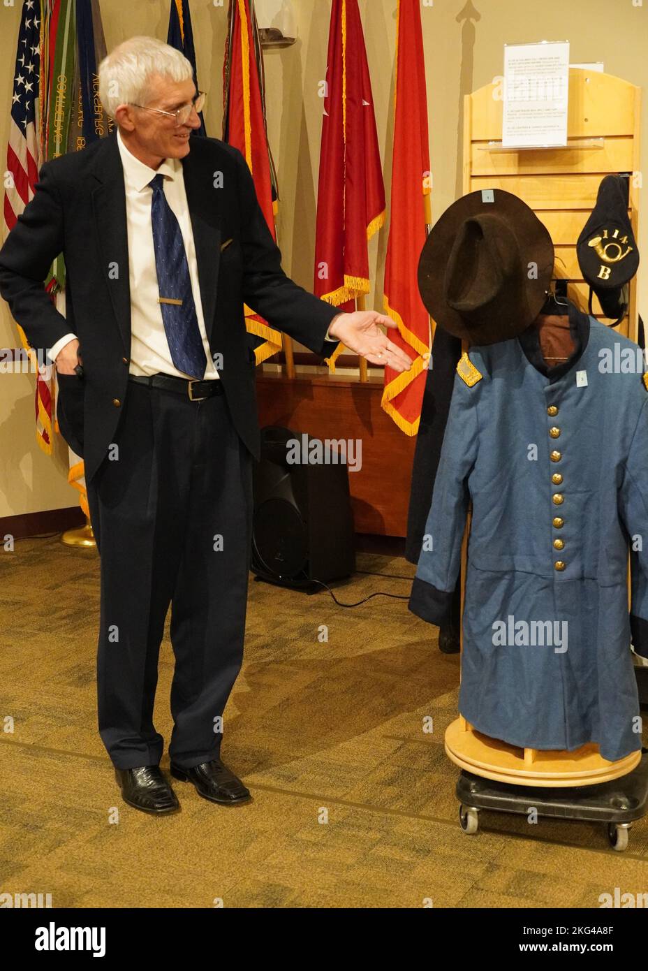 Ward Zischke, 88th Readiness Division historian, points out the ...
