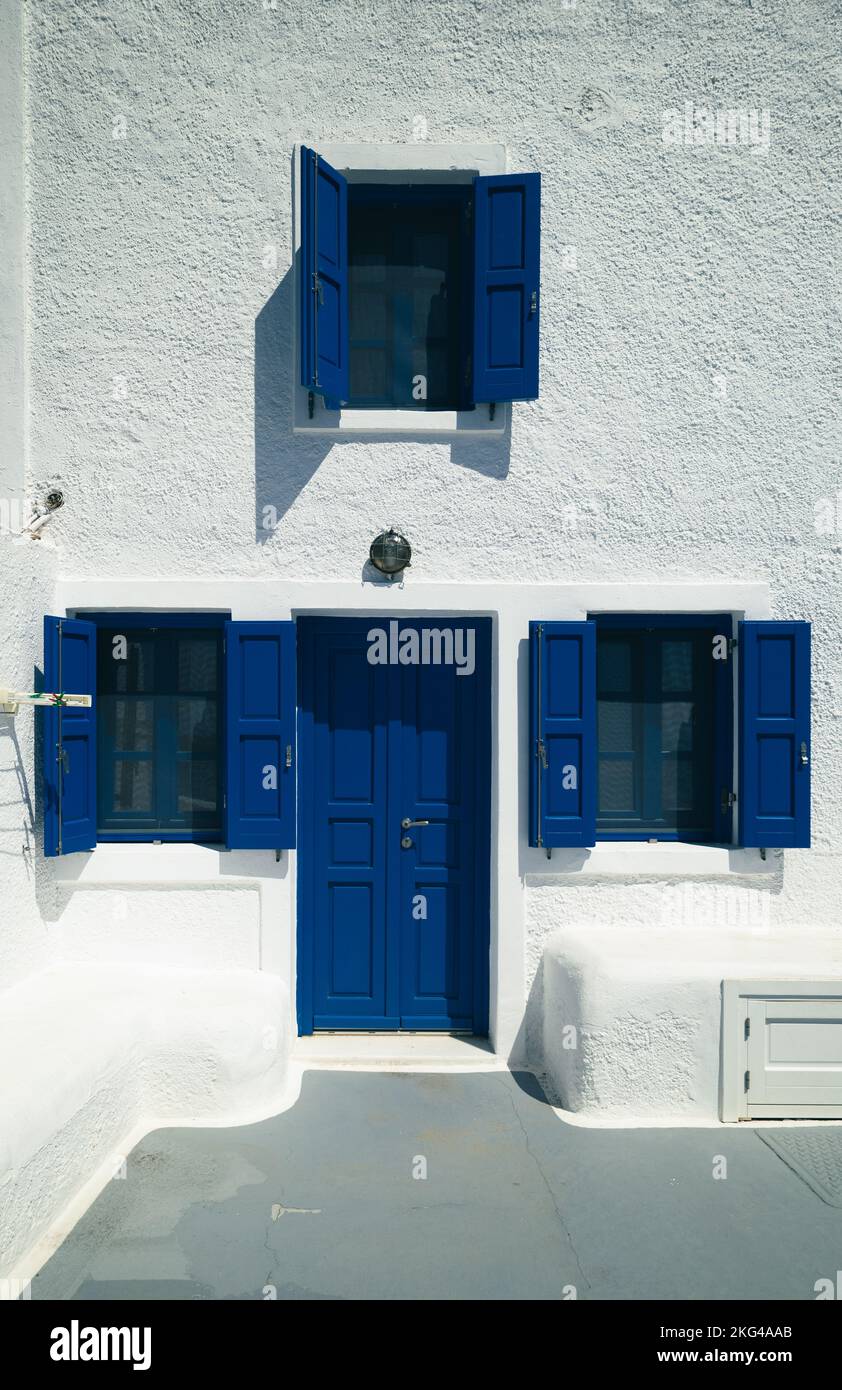 Greek blue doors and windows on greek white house Stock Photo - Alamy