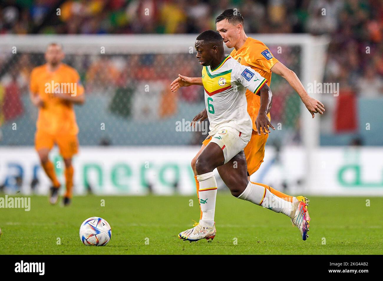 DOHA, QATAR - NOVEMBER 21: Nampalys Mendy of Senegal battles for the ball with Steven Berghuis ...