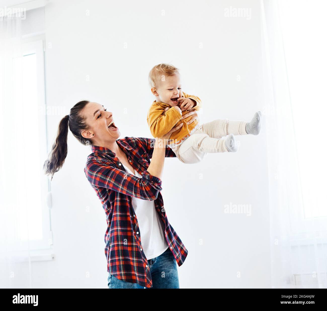 mother child baby having fun family happy childhood care cheerful cute ...