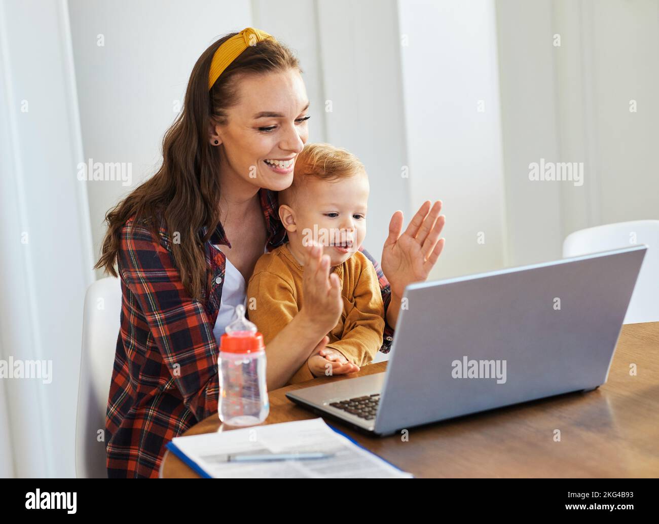 mother baby laptop computer child woman working business parent mom ...
