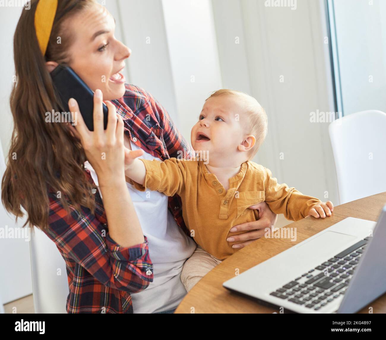 mother baby laptop computer child woman working business mobile phone ... mother baby laptop computer child woman working business mobile phone ...