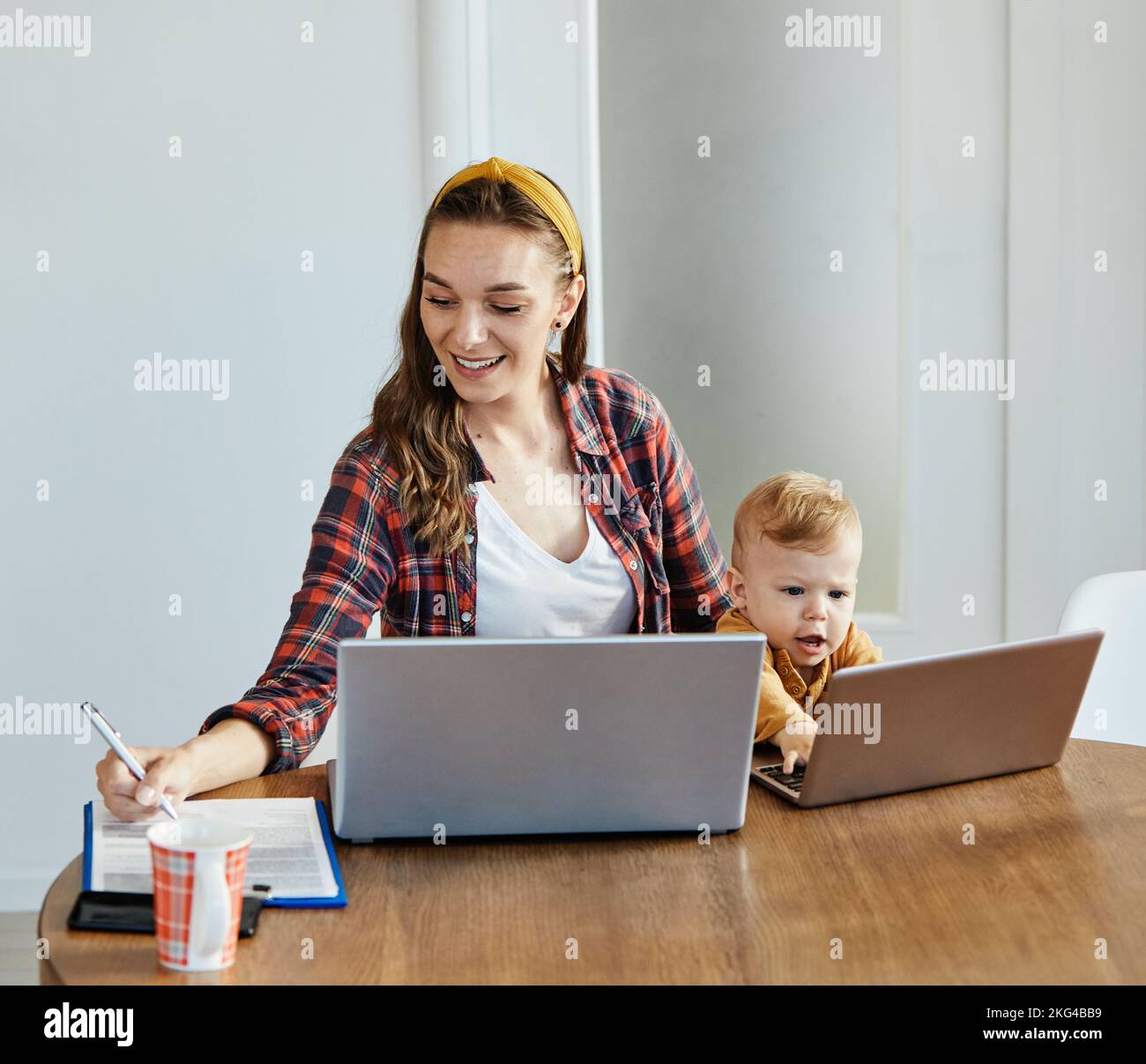 mother baby laptop computer child woman working business parent mom ...