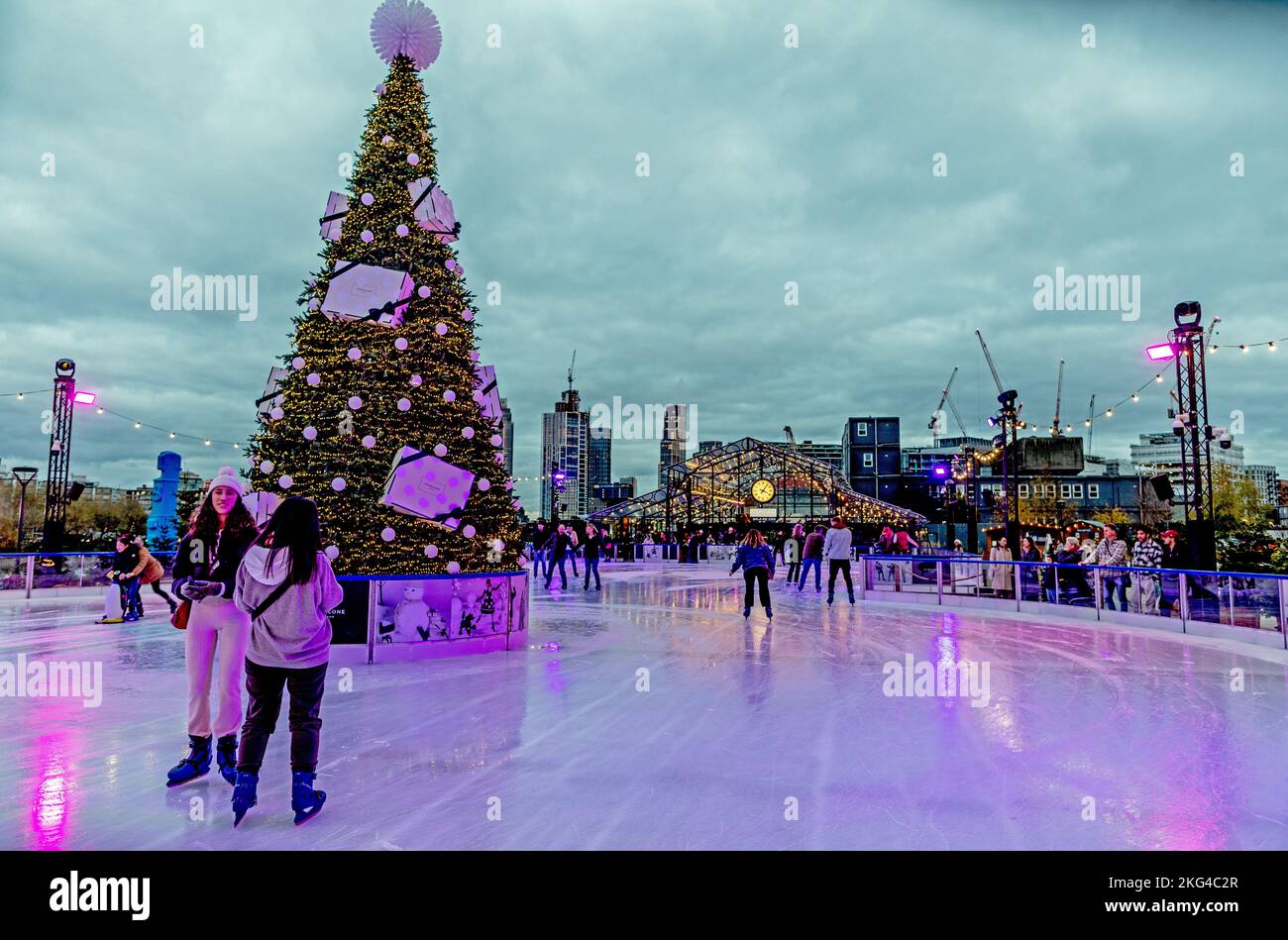 Ice Skating At Battersea Power Station at Night London UK Stock Photo ...