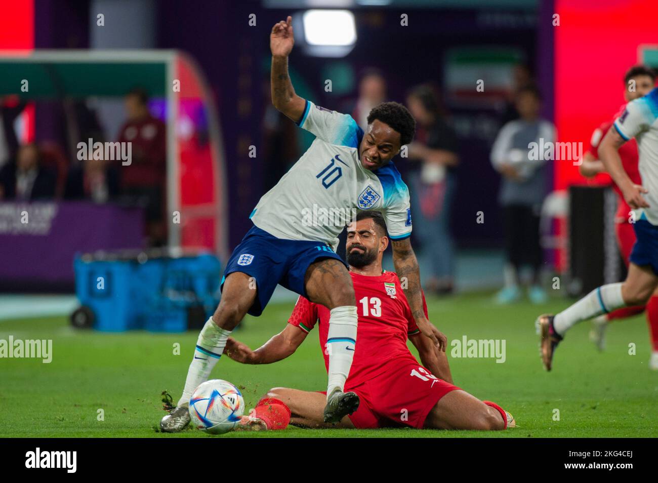 Raheem Sterling of England and Mohammad KANAANI of Iran during the FIFA ...