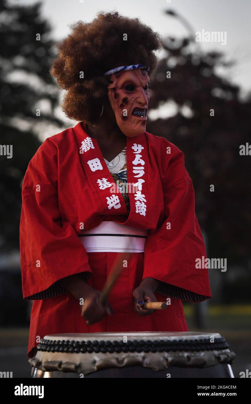 Lashae Snider, Samurai Taiko Drum Team member, performs during a Trunk ...
