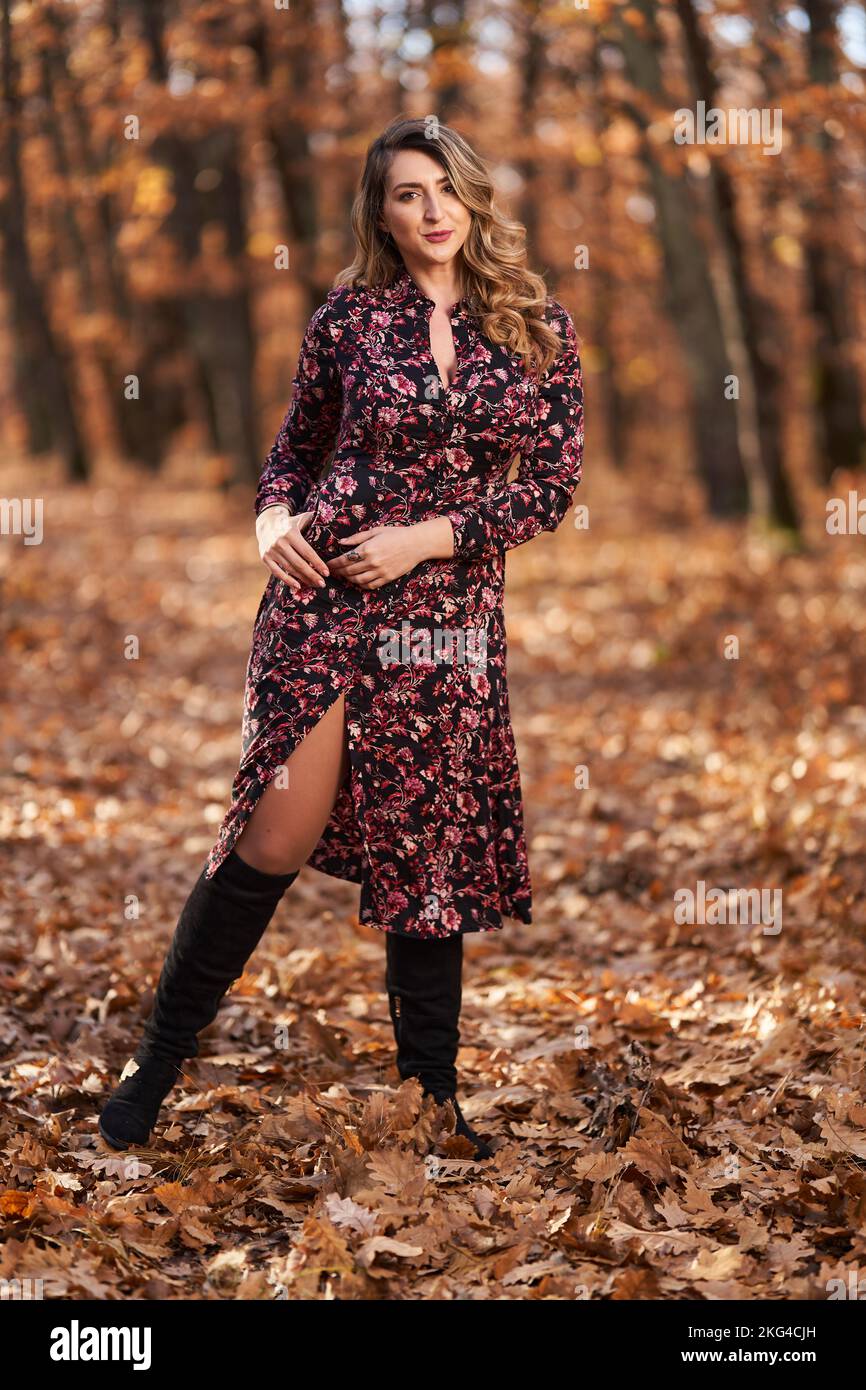 Plus size beautiful woman in an oak forest in the late autumn Stock ...