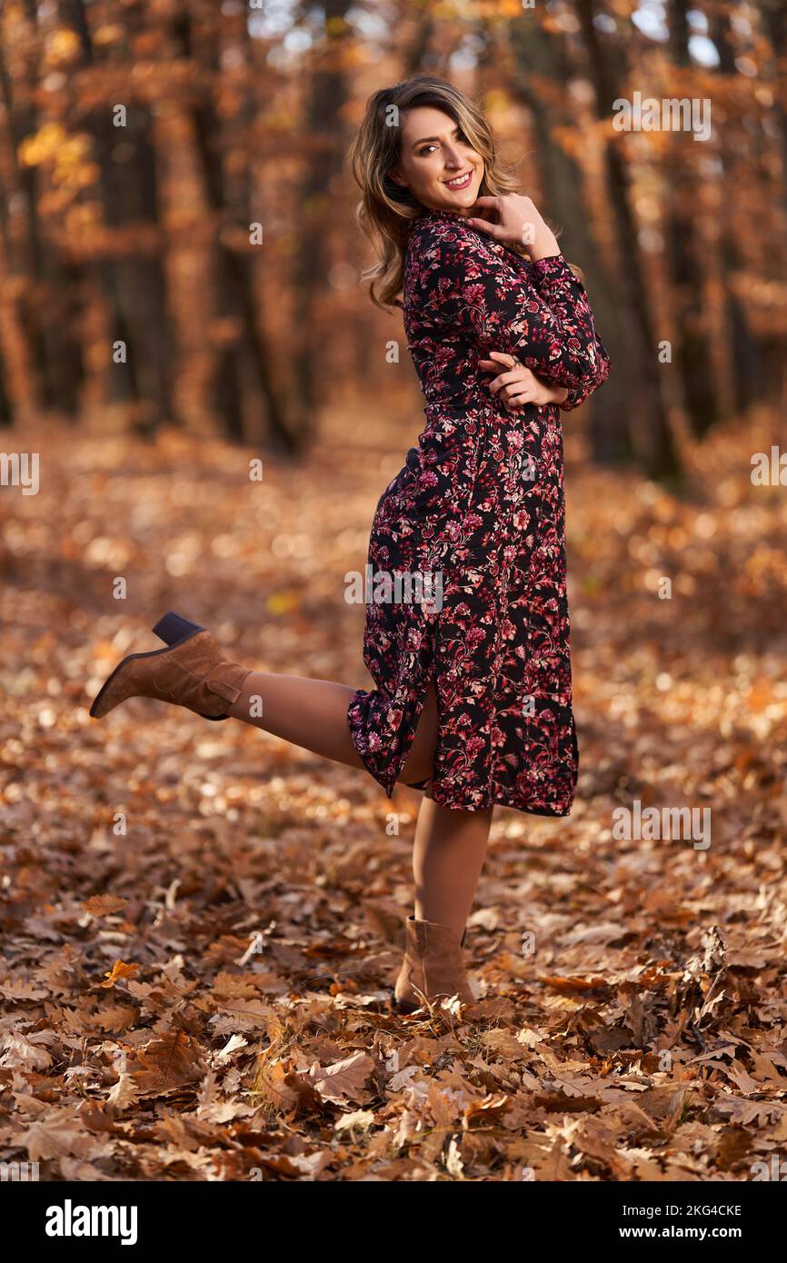 Plus size beautiful woman in an oak forest in the late autumn Stock ...