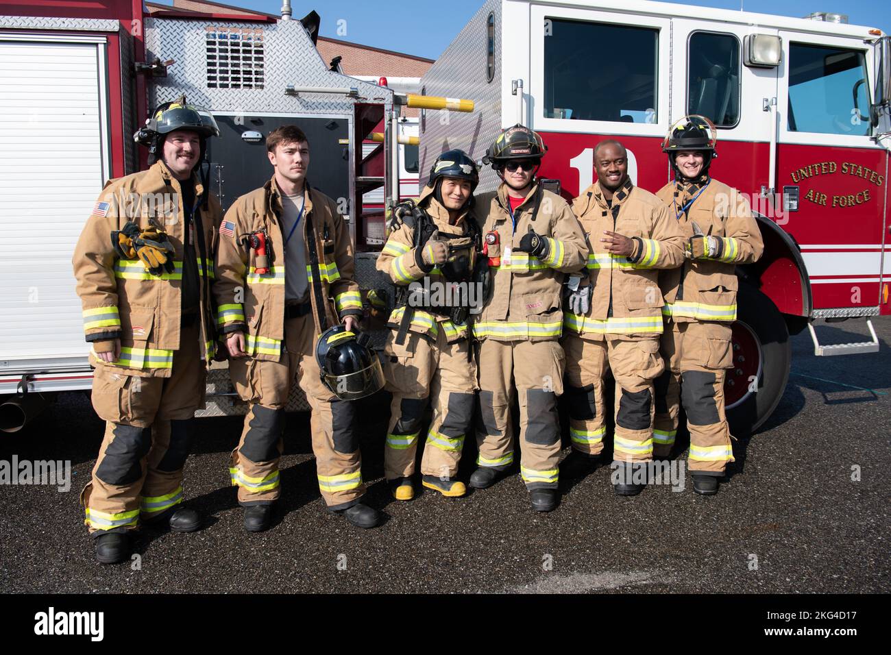 U.S. Air Force Airmen from the 8th Civil Engineer Squadron fire ...