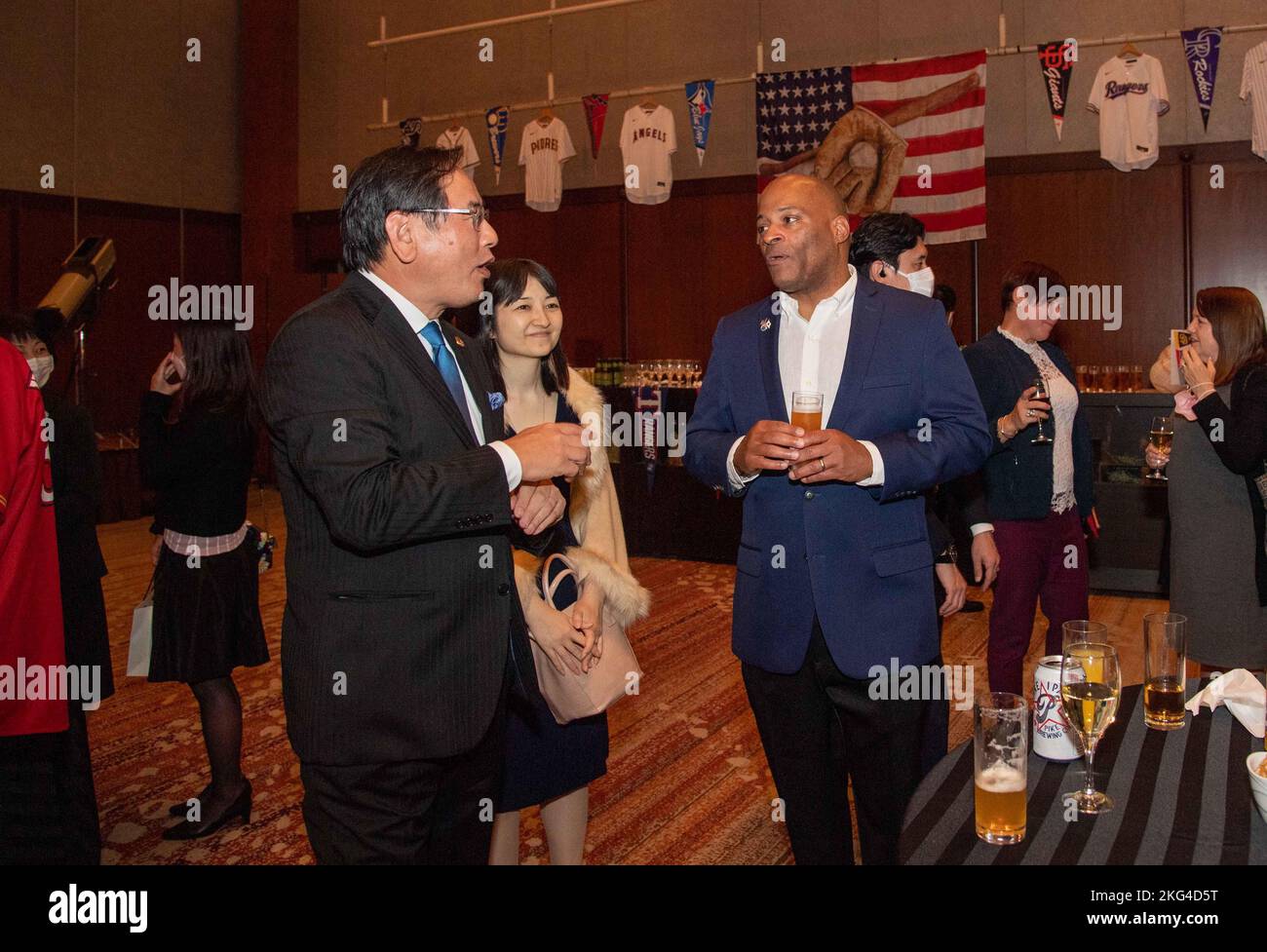 Capt. David Adams, Commander, Fleet Activities Sasebo, speaks with ...