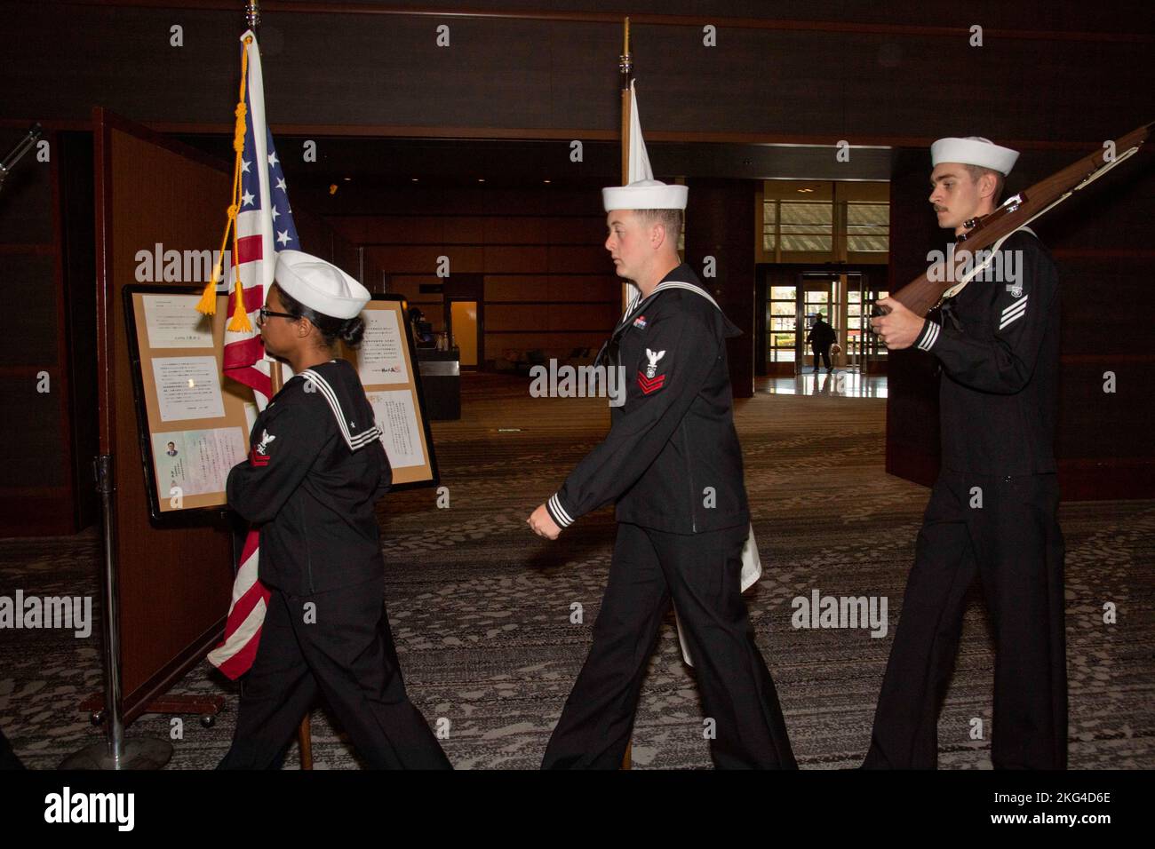 The Commander, Fleet Activities Sasebo color guard present the U.S ...