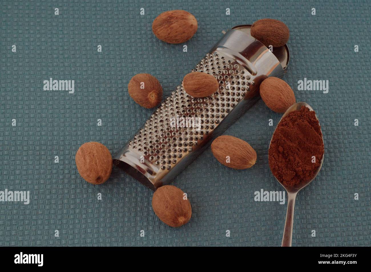 Nutmeg with grinder Stock Photo - Alamy