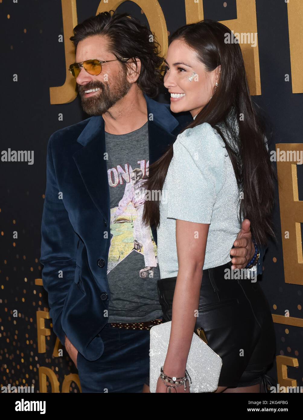 Los Angeles, California, USA. 20th Nov, 2022. John Stamos and Caitlin ...