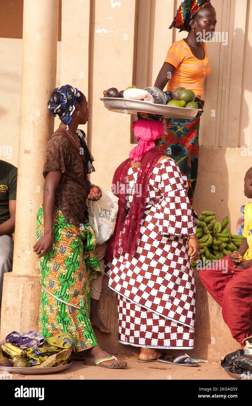 African women in colourful dress at the market in Natitingou, Atacora ...