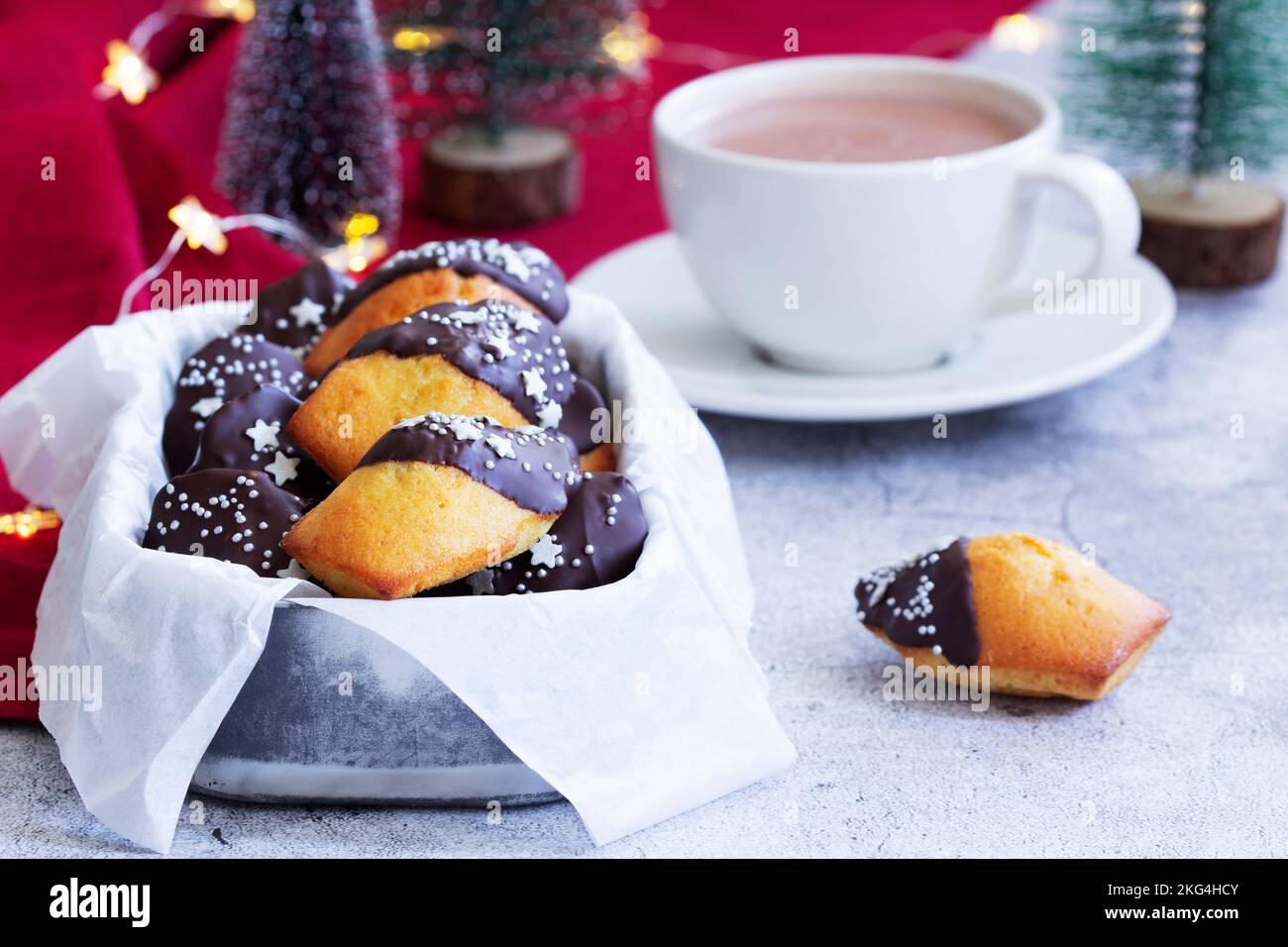 Traditional French madeleine cookies served with coffee, Christmas ...