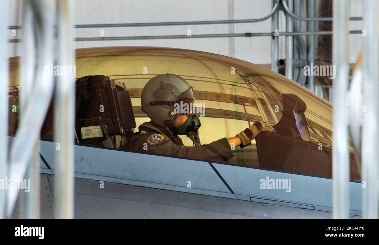 A 325th Fighter Wing F-22A Raptor pilot waits to taxi out for a mission ...