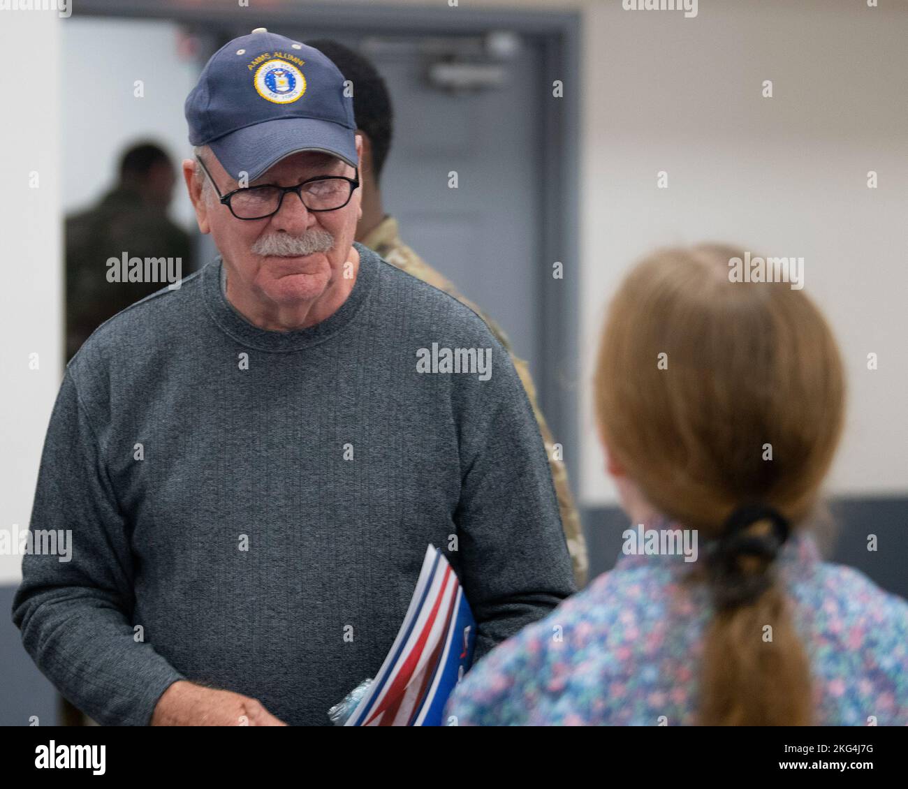 Retired Air Force Capt. Lee Puckitt talks with a vendor Oct. 28, 2022 ...