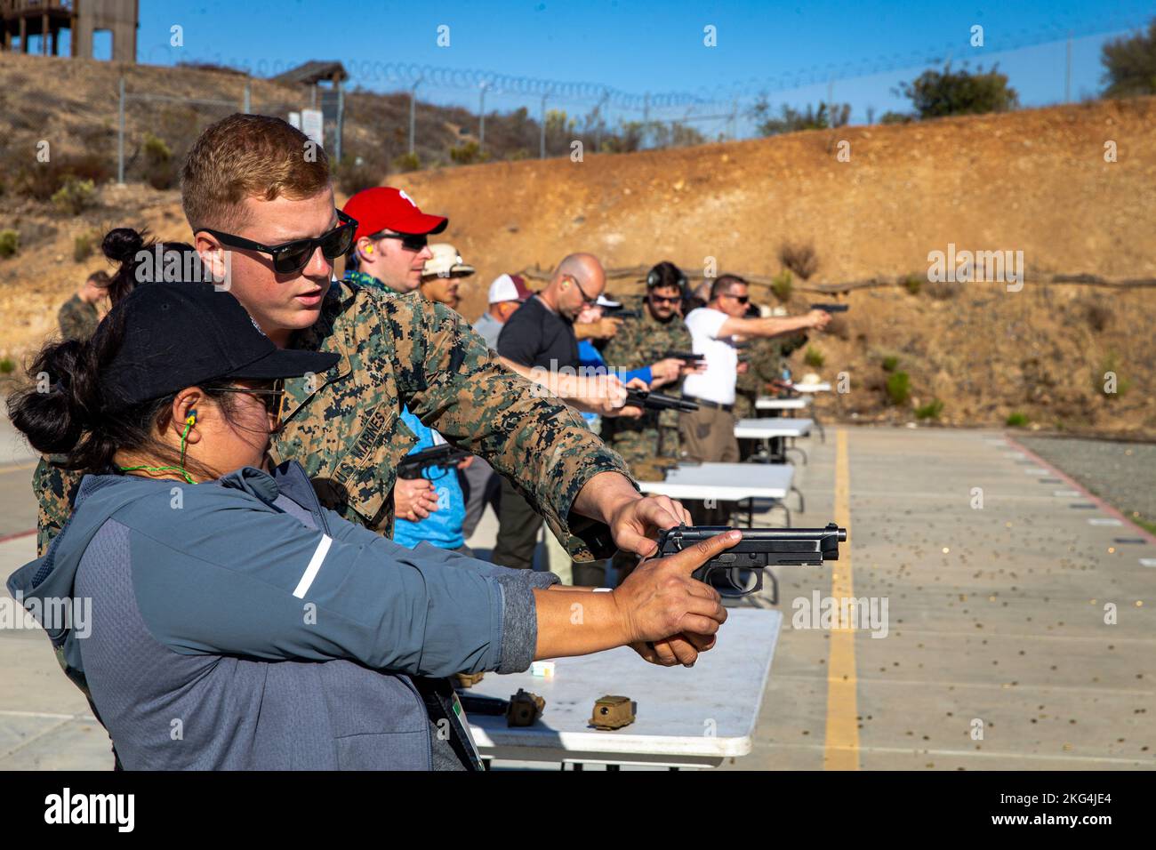 U.S. Marine Corps Lance Cpl. Wesley Miller, a marksmanship instructor ...
