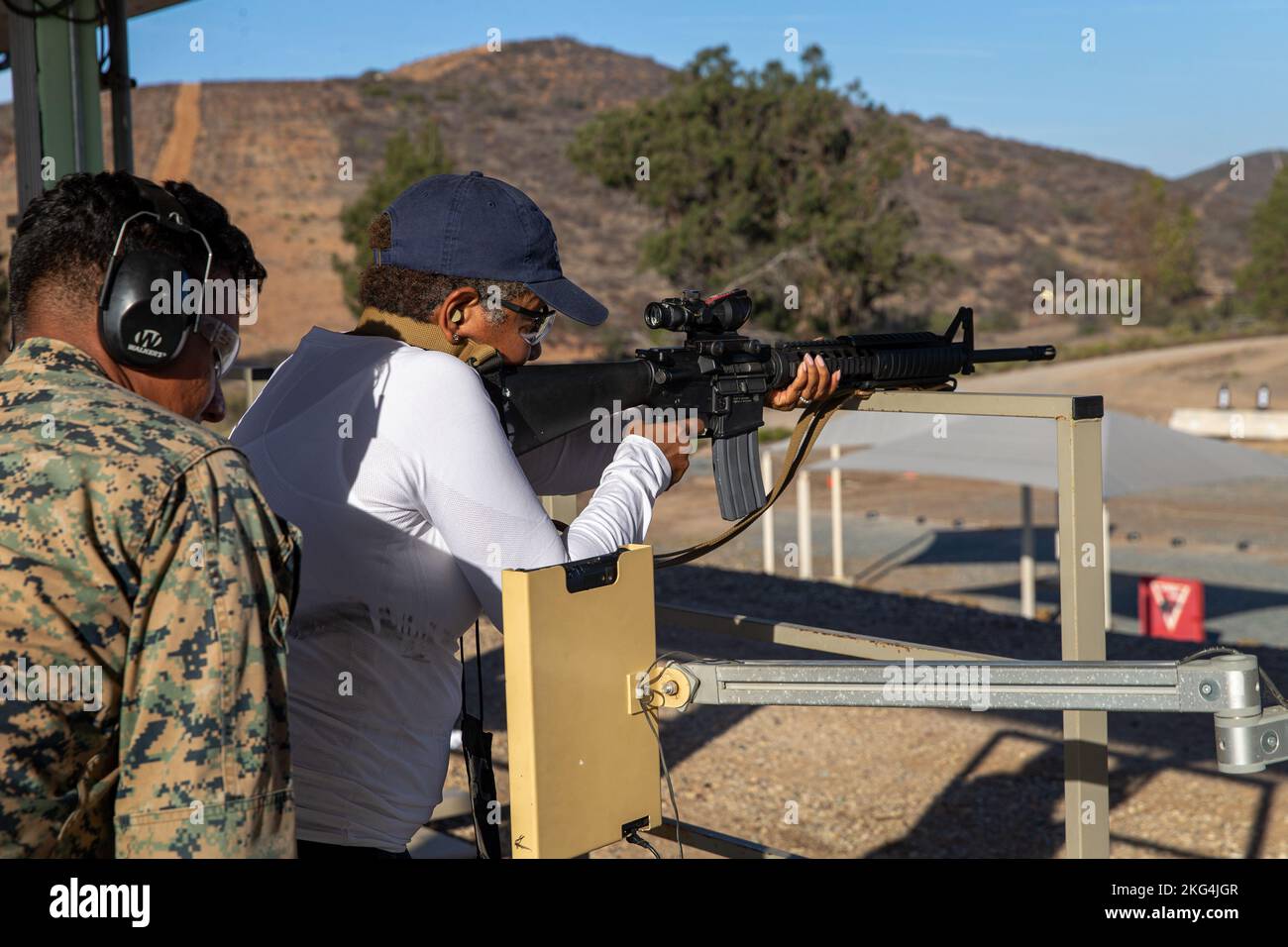 A Joint Civilian Orientation Course participant fires a M-16A4 service ...