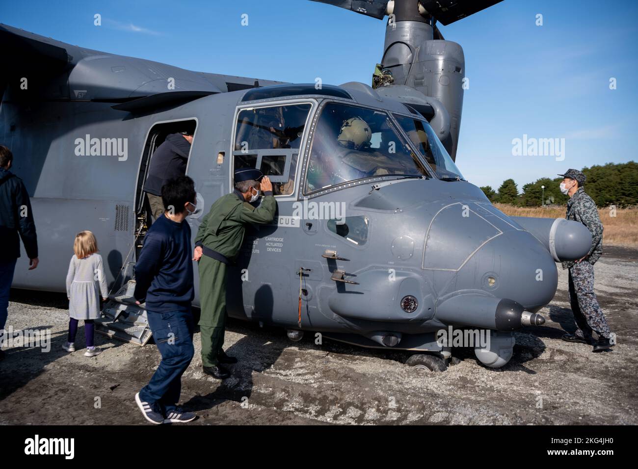 Attendees tour a CV-22 Osprey static display assigned to the 21st ...