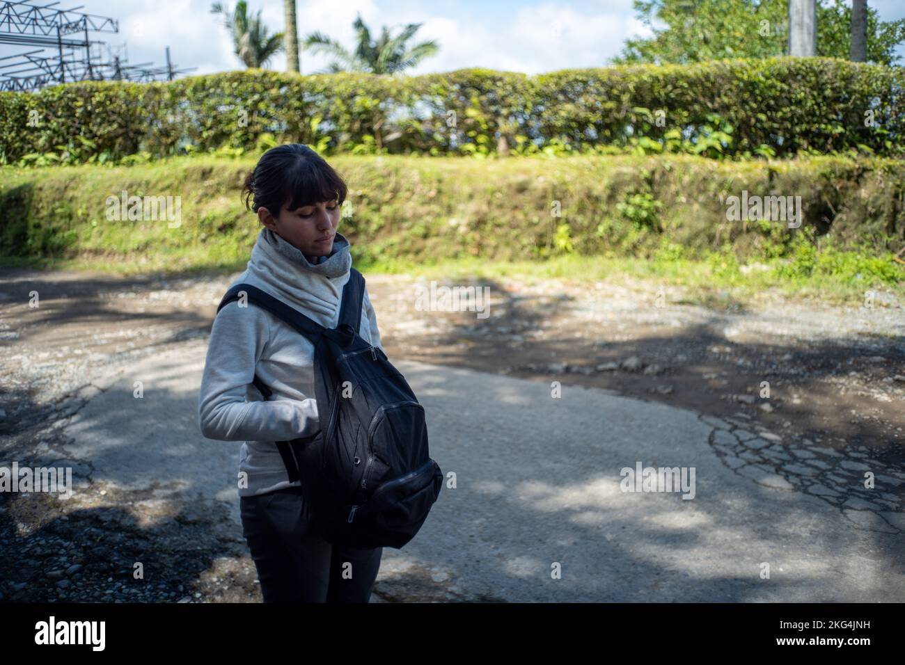 Peruvian Woman wearing a Sweatshirt and Carrying her Backpack in front ...