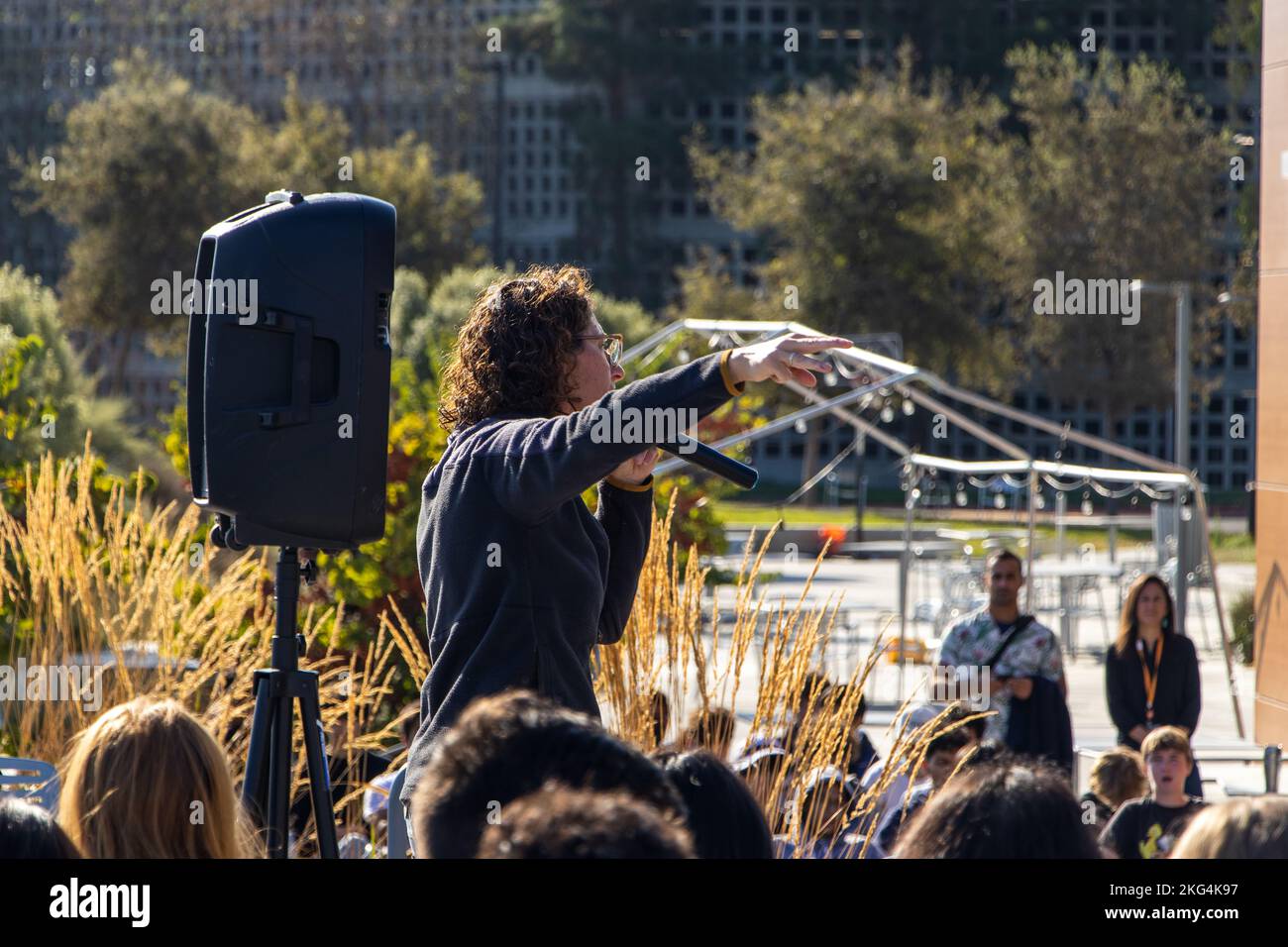 School assembly speaker with confidence in daylight outside Stock Photo ...